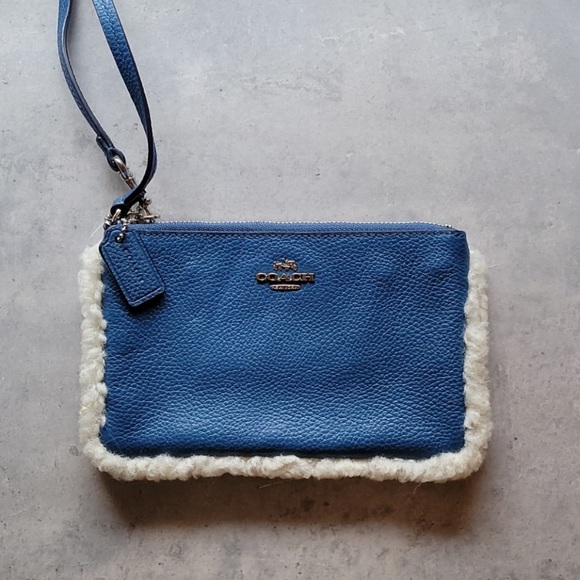 Coach | Bags | Coach Blue Pebbled Leather Shearling Wristlet | Poshmark
